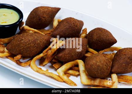 Stuffed meatballs, a traditional Turkish delicacy. Kibbeh is a popular ...