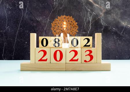 February 08. 8th day of the month, wooden calendar isolated on a white ...