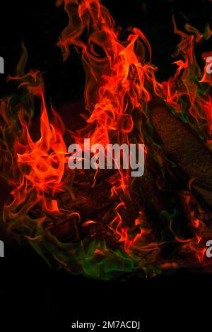 fiery wallpaper. Variegated flames and colorful sparks.Multicolored ...