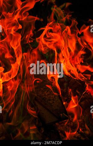fiery wallpaper. Variegated flames and colorful sparks.Multicolored ...