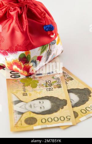 Korean traditional lucky bag and Korean banknotes Stock Photo - Alamy