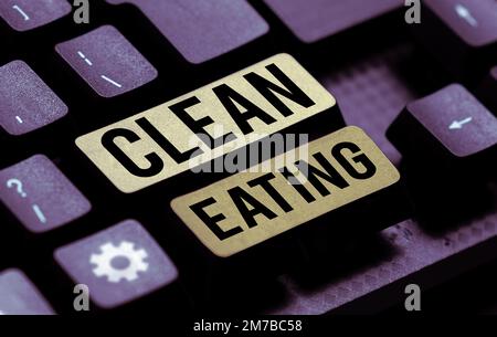 Hand writing sign Clean Eating. Business idea Practice of eating only ...