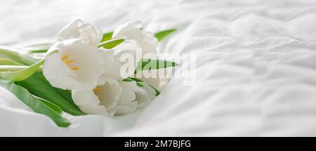 Panoramic web banner woman with a flower in her hair relaxing at a ...