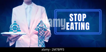 Text showing inspiration Stop Eating. Concept meaning cease the ...
