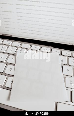 Sheet of paper on keyboard Stock Photo - Alamy
