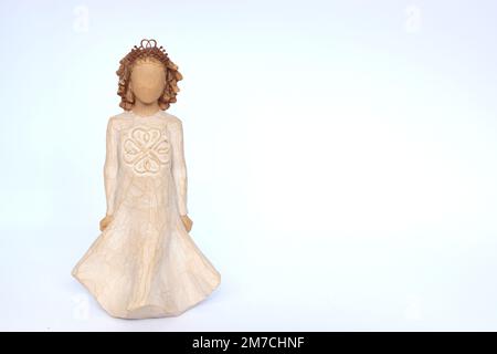 a beautiful Demaco Willow tree ornament of a man sitting on books ...