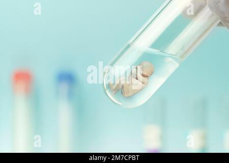 Artificial insemination. Test tube baby, IVF. On the tip of the needle ...