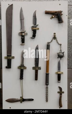 Weapons seized by law enforcement officers working in concert with the ...