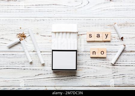 Cigarette And Wooden Blocks, Broken cigarette on table background, No ...
