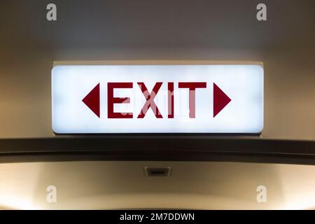 EXIT door sign on an Airbus A320 airplane Air plane aeroplane aircraft ...