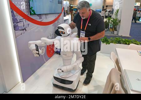 Aeo, a service robot from Aeolus Robotics is shown at the Aeolus booth ...