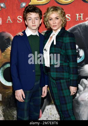 Amy Carlson, right, and son Nigel Butler attend the premiere of "Puss ...