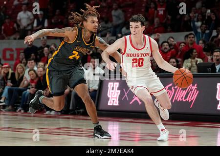 North Carolina A&T guard Demetric Horton (24) is defended by Houston ...