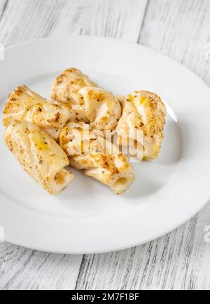 Portion of fried asian style calamari on the plate Stock Photo - Alamy