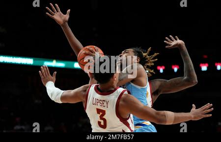 McNeese State forward Christian Shumate, right, drives the ball inside ...