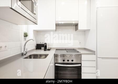 Modern handleless kitchen with sink with stainless steel single-lever ...