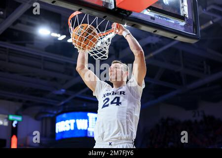 Xavier's forward Jack Nunge (24) deflects the ball as Cincinnati's ...