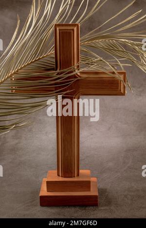 Catholic Cross with palm leaf and burning candle. Ash Wednesday, Lent ...
