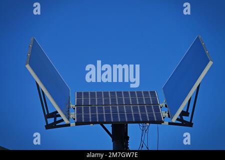 Solar panel modules with side reflectors to increase energy output ...