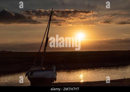 Sunset and dusk at Blakeney amongst the boats, Norfolk Coast, Norfolk ...