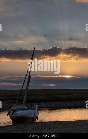 Sunset and dusk at Blakeney amongst the boats, Norfolk Coast, Norfolk ...