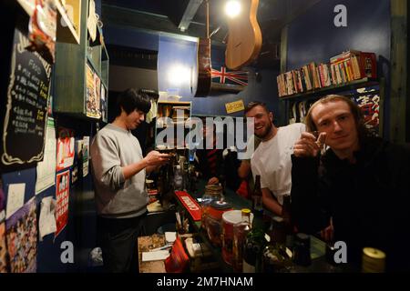 Drinking in a small atmospheric pub in the Golden Gai pub area in ...