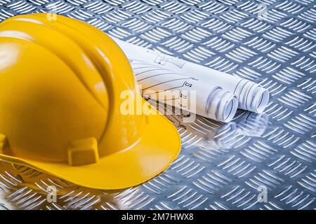 Blueprint rolls on corrugated metal plate construction concept Stock ...