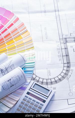 color palette and blueprints with calculator Stock Photo - Alamy