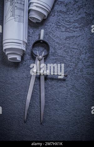 Close up of compass on blueprints Stock Photo - Alamy