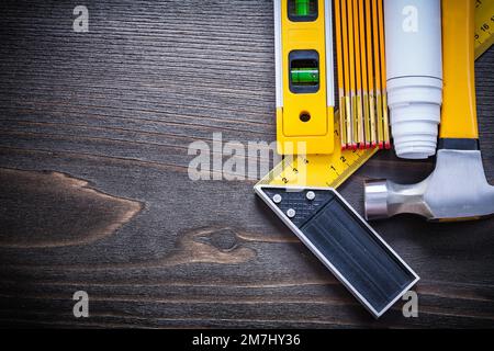 Set of vintage claw hammer square ruler and surface gage Stock Photo ...