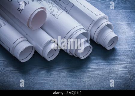 Stack of rolled blueprints on board Stock Photo - Alamy