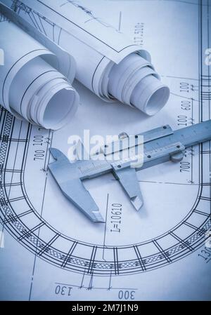 Construction drawings metal caliper on blueprint architecture and ...