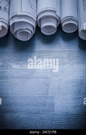 vertical view stack of rolled blueprints on board Stock Photo - Alamy