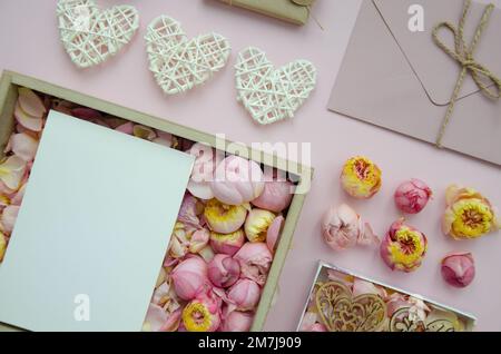 Composition of rose petals and hearts on white background Stock Photo ...