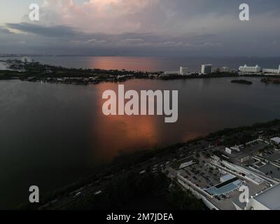 An aerial view of cityscape Miami surrounded by buildings and water ...