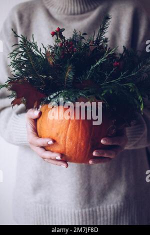 Rich autumn bouquet in the hands of a girl on a light background Stock ...