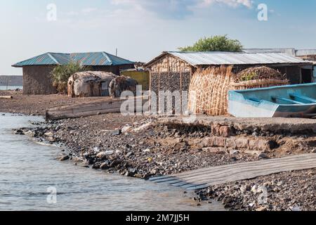 Traditional houses of the El Molo people in El Molo village living at ...