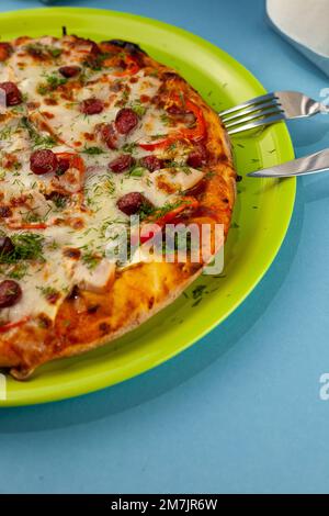 Delicious pizza with olives and sausages on wooden table, top view ...