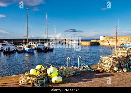Hopeman village Moray Coast Scotland sunlight on a row of colourful ...