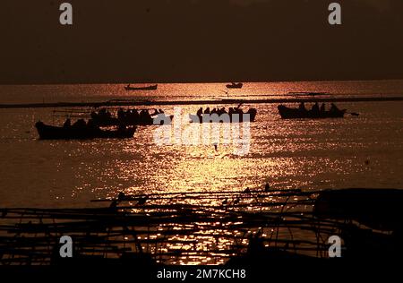 Prayagraj, India. 10th Jan, 2023. People enjoy boating at the bank of ...
