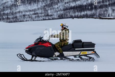 snowmobile takes off Stock Photo - Alamy