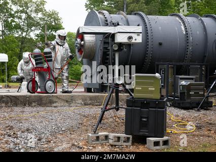 Arnold Engineering Development Complex team members swap out a depleted ...