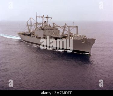 A bow view of the amphibious cargo ship USS EL PASO (LKA-117) at anchor ...