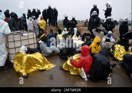 Erkelenz, Germany. 10th Jan, 2023. Police vehicles on the edge of the ...