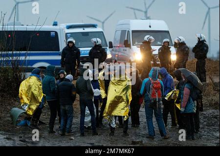 Erkelenz, Germany. 10th Jan, 2023. Police vehicles on the edge of the ...