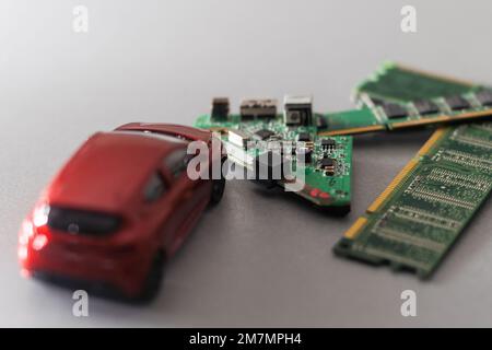 CPU chip and semiconductors with car toy. Global car chip shortage ...