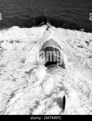 An aerial stern view of the nuclear-powered aircraft carrier USS NIMITZ ...