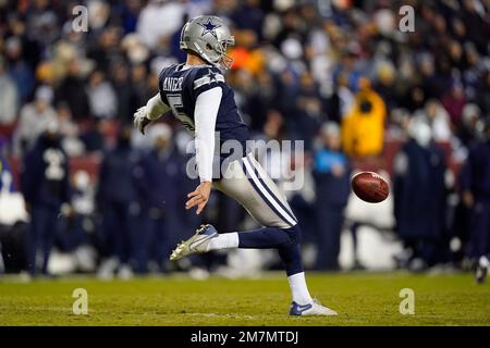Dallas Cowboys punter Bryan Anger kicks a punt in the second half of an ...