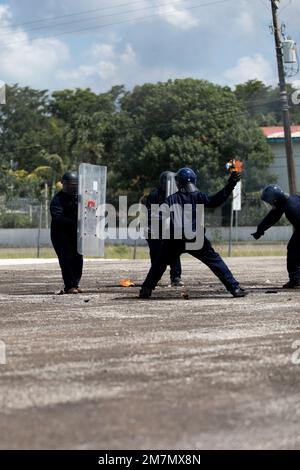 BELMOPAN, Belize (May 11, 2022) Police officers and service members ...