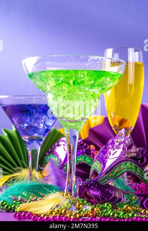 Mardi gras cocktails set. Colorful purple, yellow, green martini ...